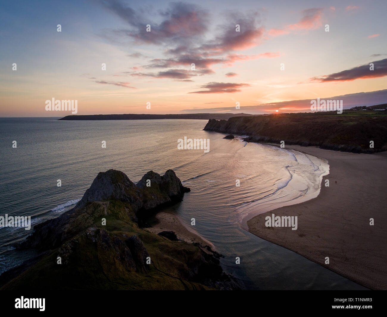 Aerial view of Three Cliffs Bay south coast beach the Gower Peninsula ...