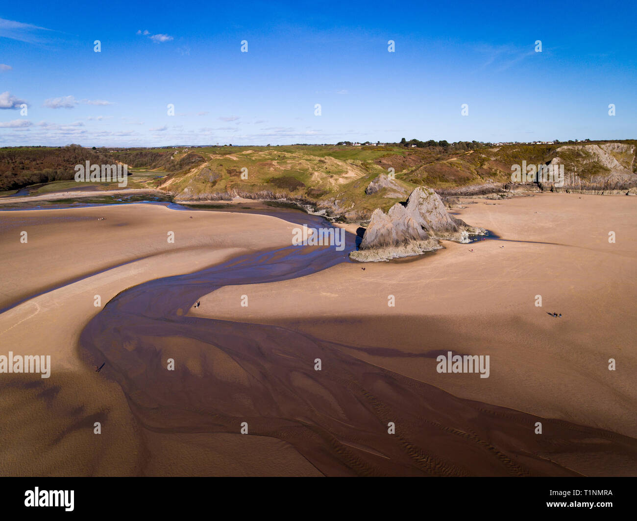 Aerial view of Three Cliffs Bay south coast beach the Gower Peninsula ...