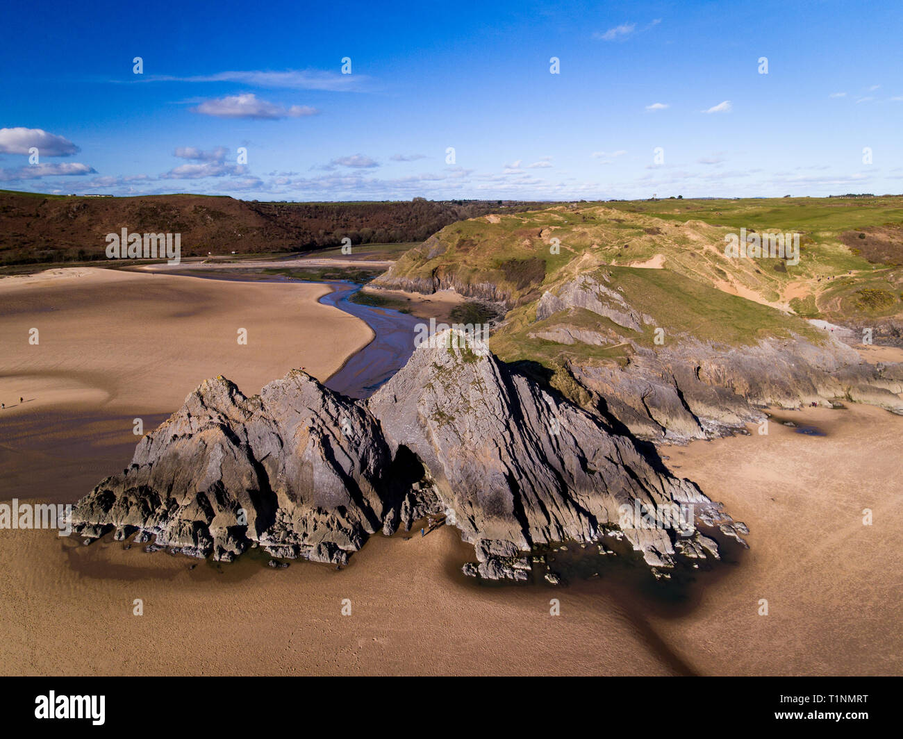 Aerial view of Three Cliffs Bay south coast beach the Gower Peninsula ...