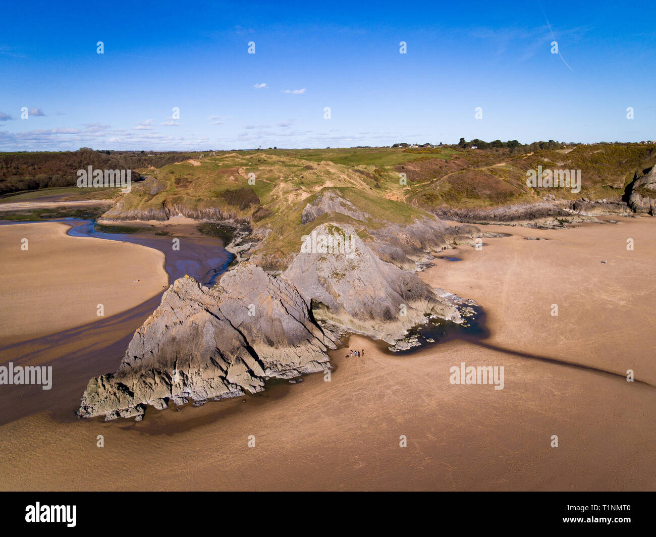 Aerial view of Three Cliffs Bay south coast beach the Gower Peninsula ...