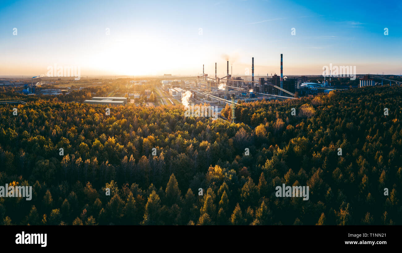 industrial landscape with heavy pollution produced by a large factory ...