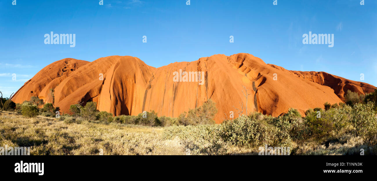 Panoramic evening view of one side of Uluru, from inside the Uluru–kata ...
