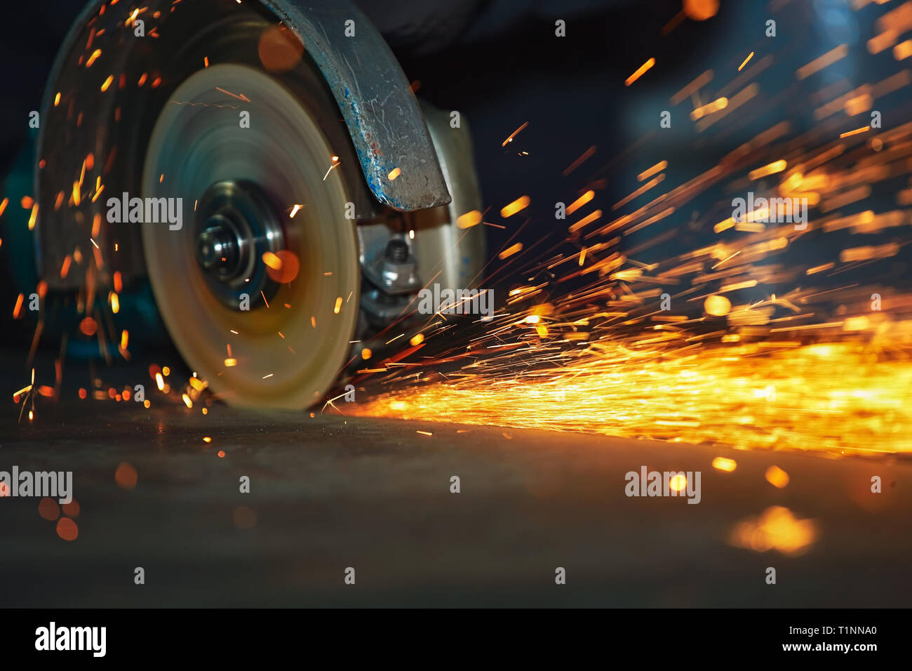 Close-up of the rotation of the disk angle grinder during operation ...