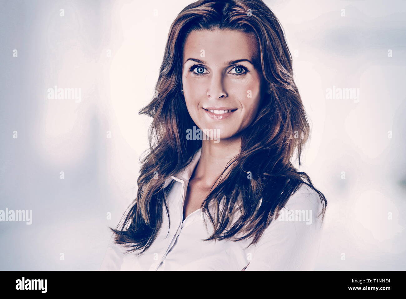 Young, attractive, successful business woman, confidently looking ...