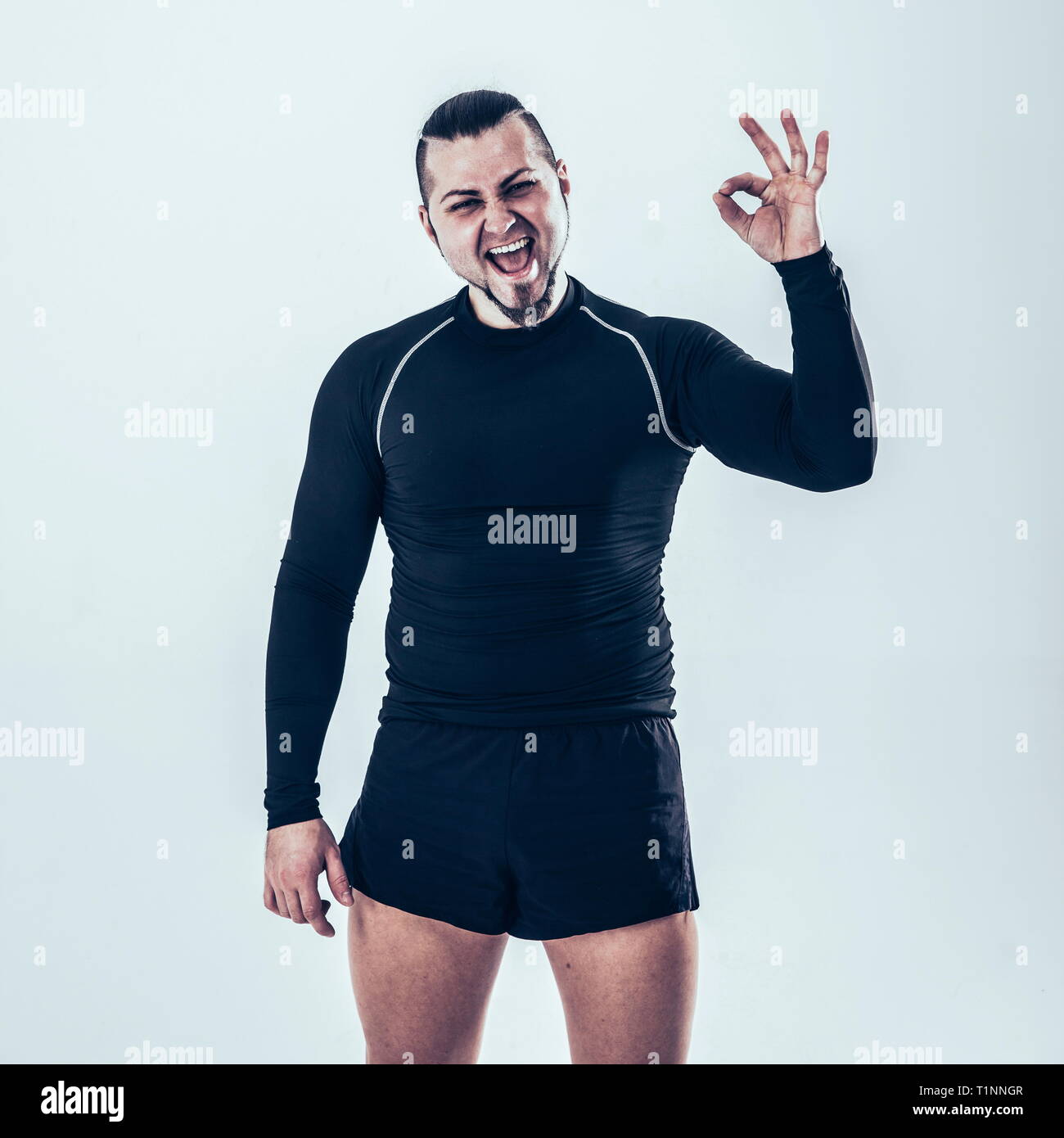 concept of victory in sports-happy bodybuilder rejoice their vic Stock ...