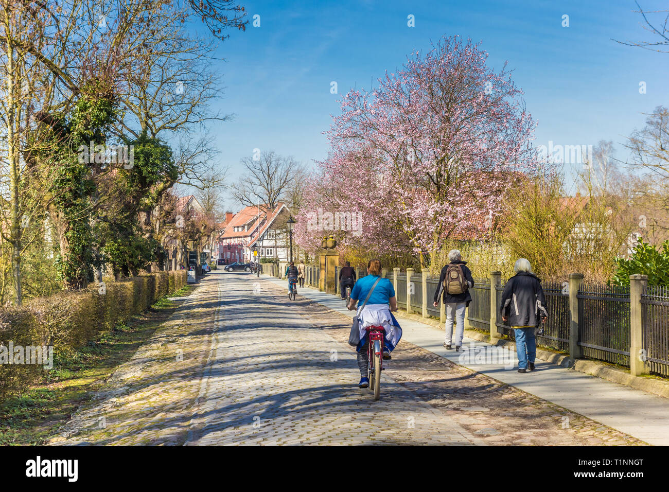 People walking and cycling in the historic city Rheda, Germany Stock ...