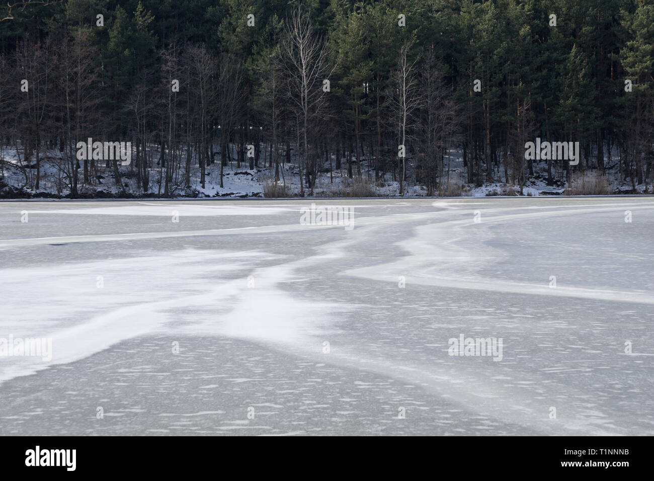 Frozen lake in winter Stock Photo - Alamy