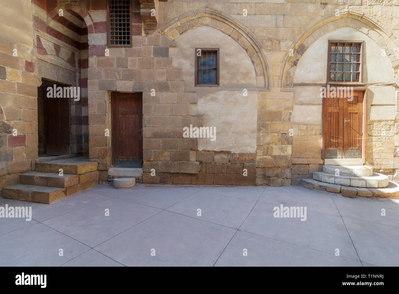 Facade of Bayt al Razzaz, a Mamluk era historic building with grunge ...