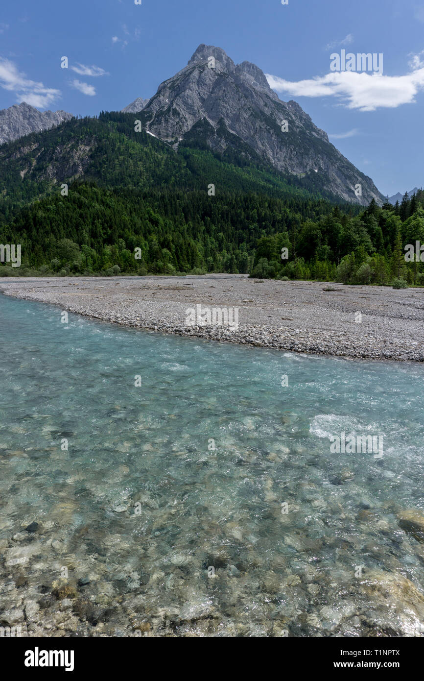 Gorgeous river in the Alps (vertical Stock Photo - Alamy