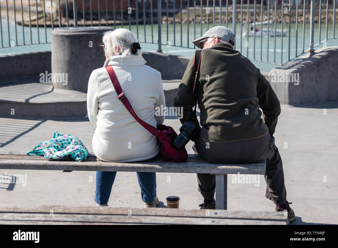 Old lady sat on bench hi-res stock photography and images - Alamy