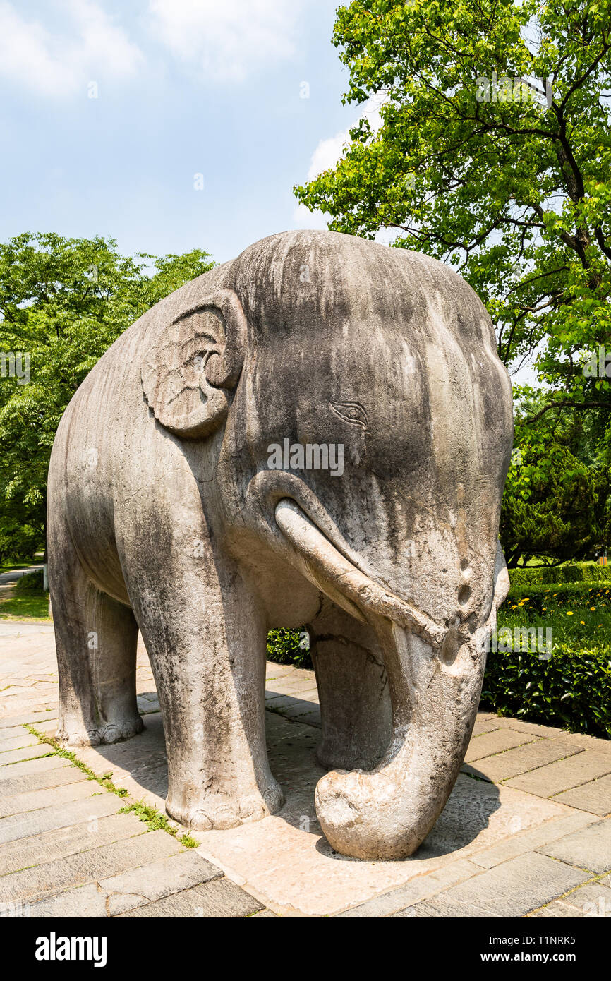 Statue of an elephant in the sacred way in Ming Xiaoling Mausoleum ...