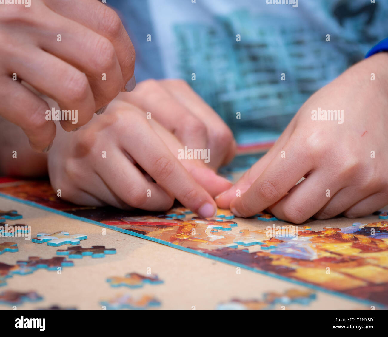 Solving puzzle hi-res stock photography and images - Alamy