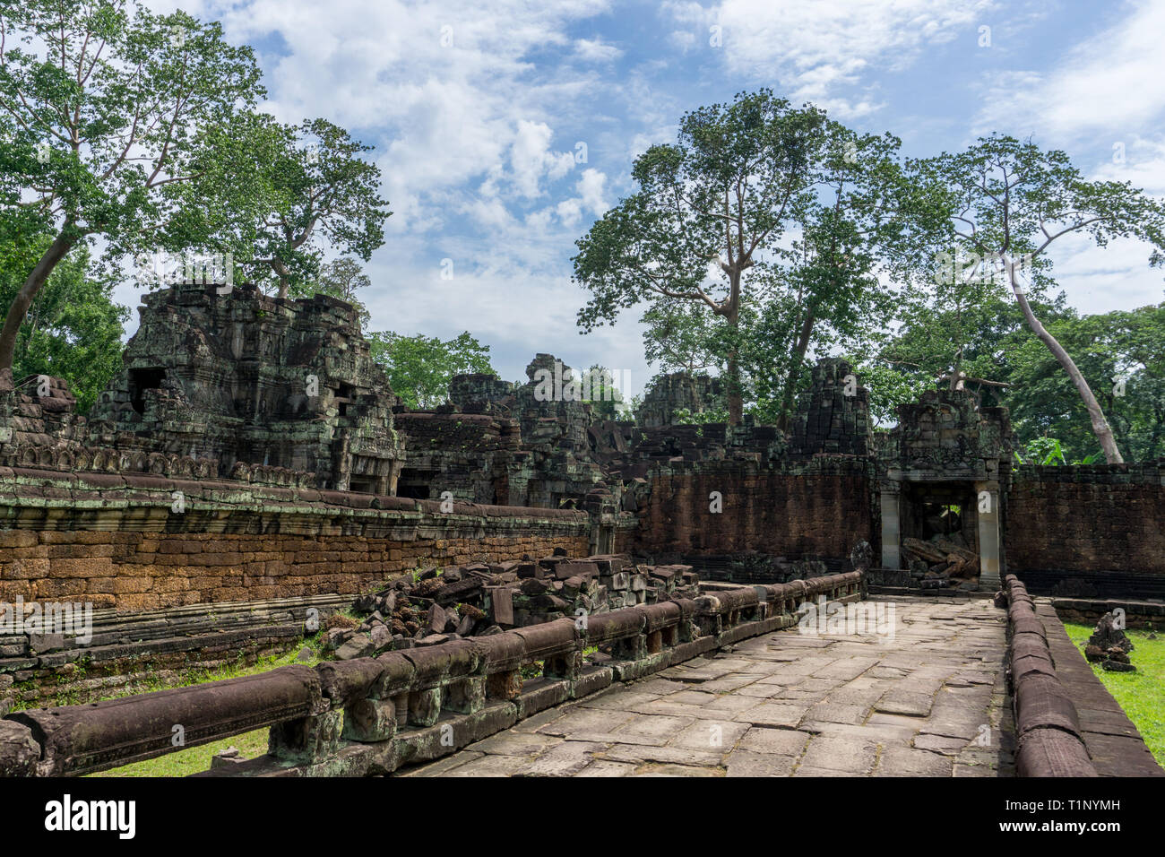Stone walkway inside a temple in the Angkor UNESCO World Heritage Site ...