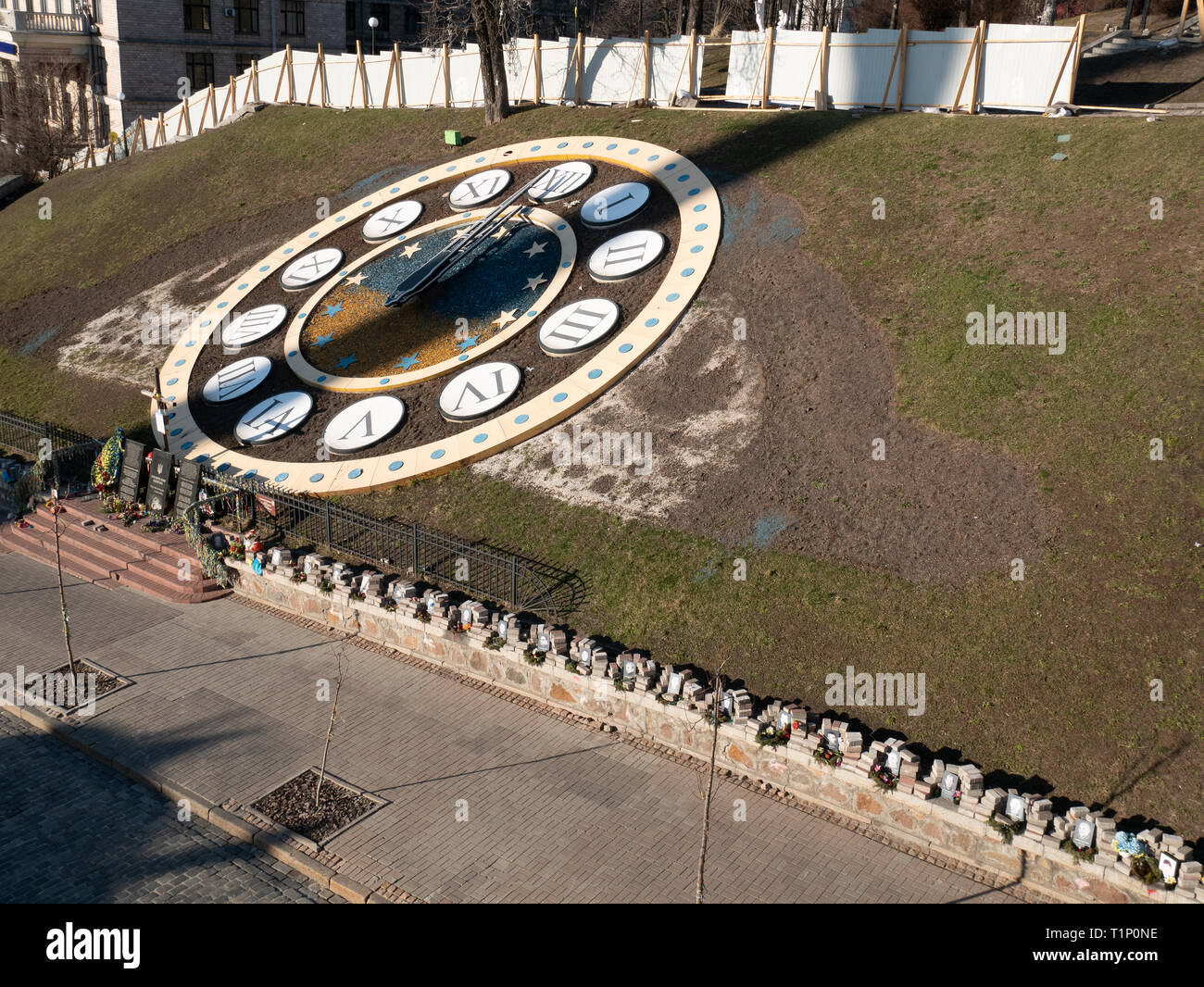 KYIV, UKRAINE - MARCH 13, 2019: Huge clocks at open air made of flowers ...