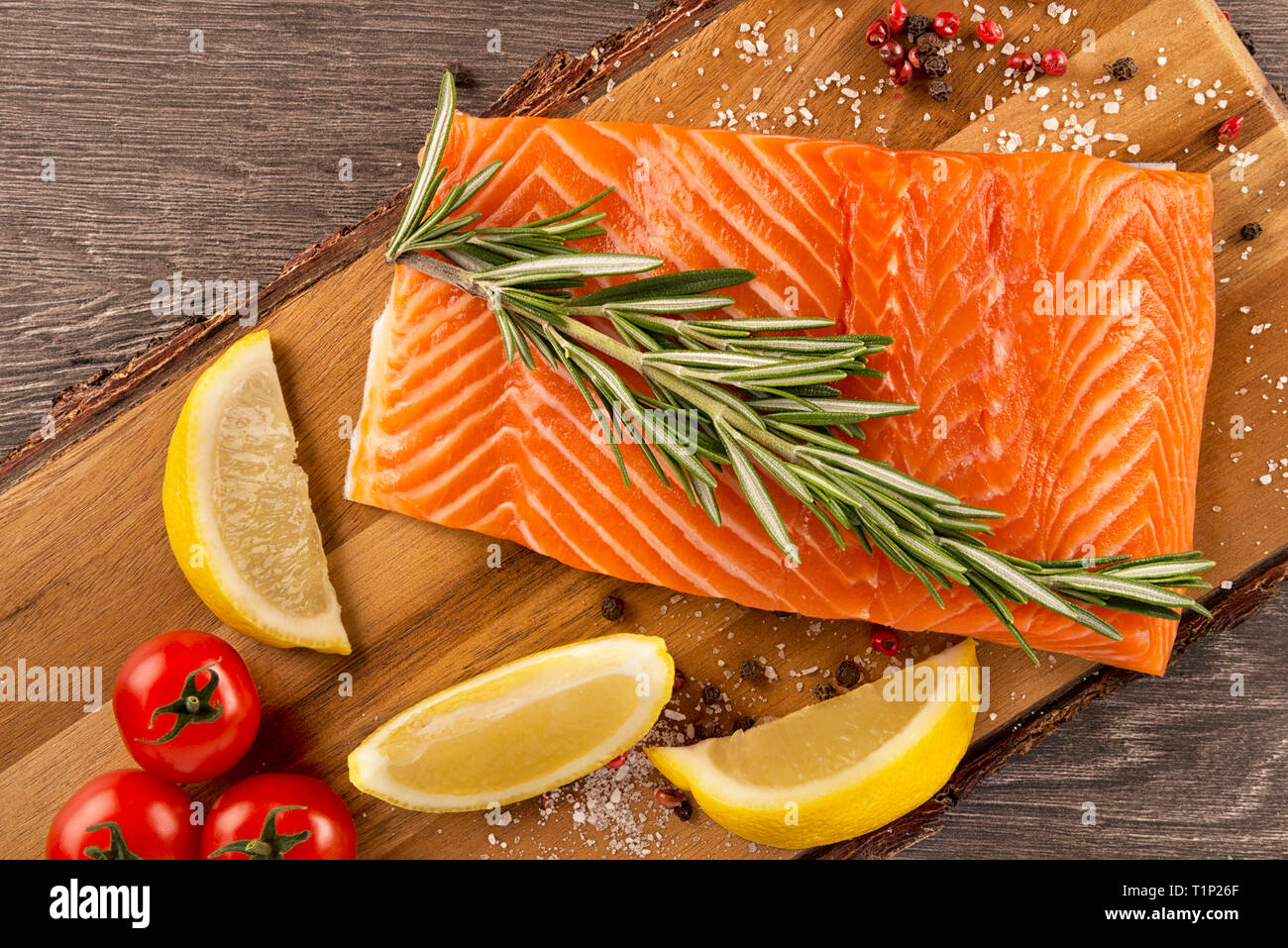 Delicious portion of fresh salmon fillet with aromatic herbs Stock ...