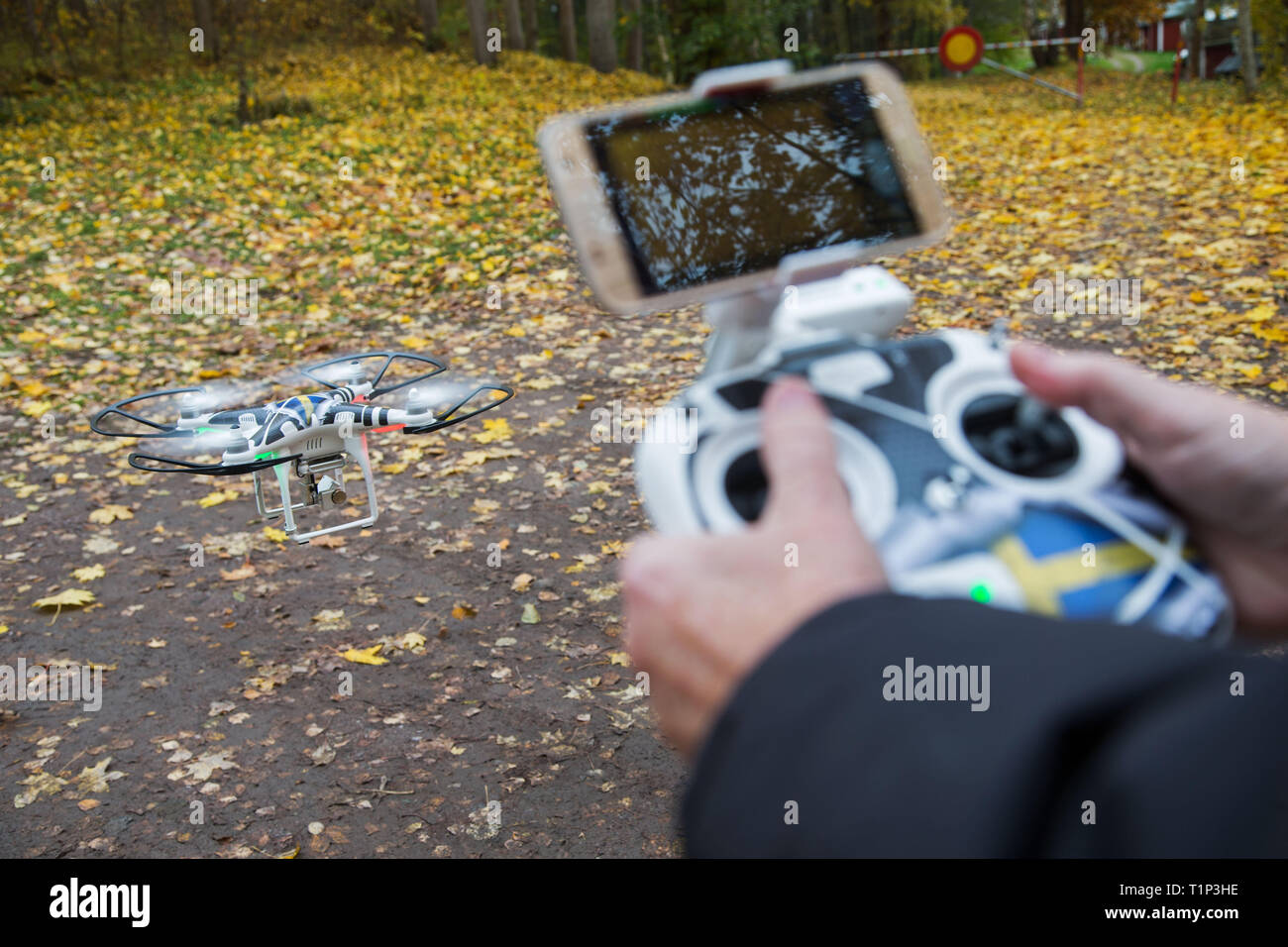 Someone flying with a drone, with a camera mounted, even though it is ...