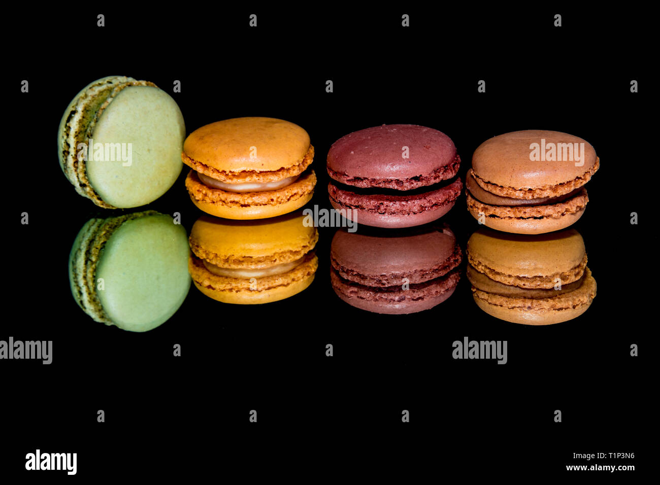 Tasty colorful macaroon homemade isolated on dark background Stock ...