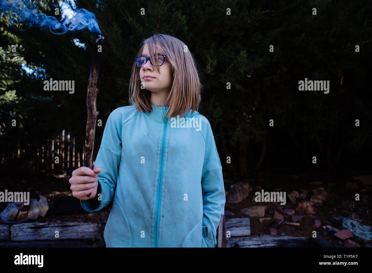 Girl by fire hi-res stock photography and images - Alamy