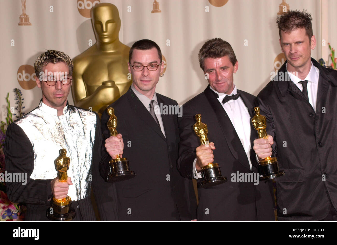 LOS ANGELES, CA. March 26, 2000: "The Matrix" visual effects team John Gaeta (left), Janek Sirrs ...