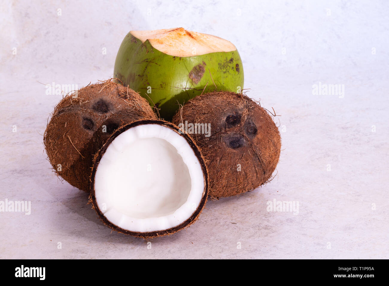 Coconuts with with background Stock Photo - Alamy