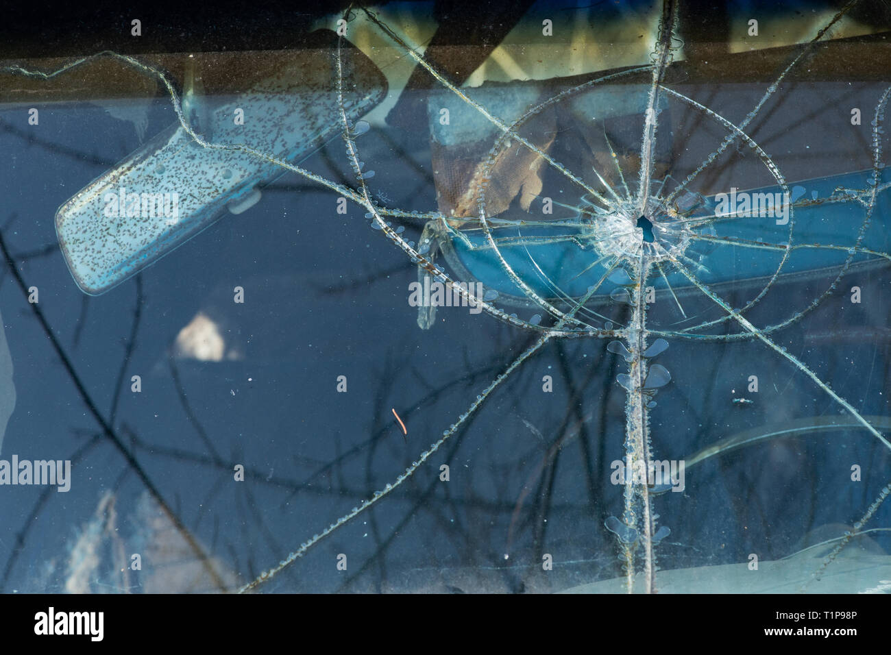 Old rusty and damaged antique car wreck in very poor condition on house ...