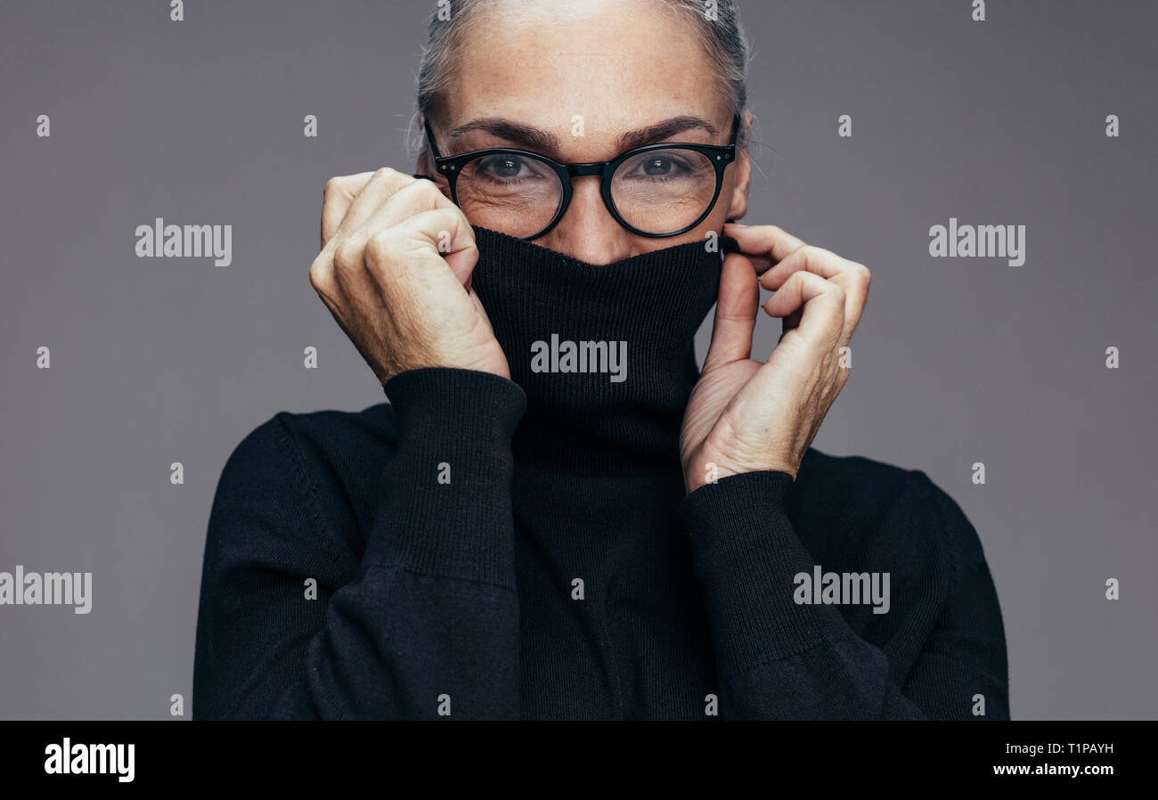 Woman covering face cold hi-res stock photography and images - Alamy