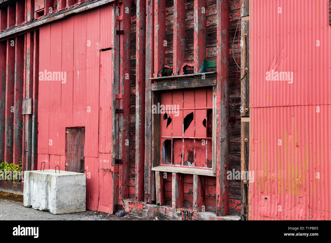 Abstract old red warehouse building wall in daylight Stock Photo - Alamy