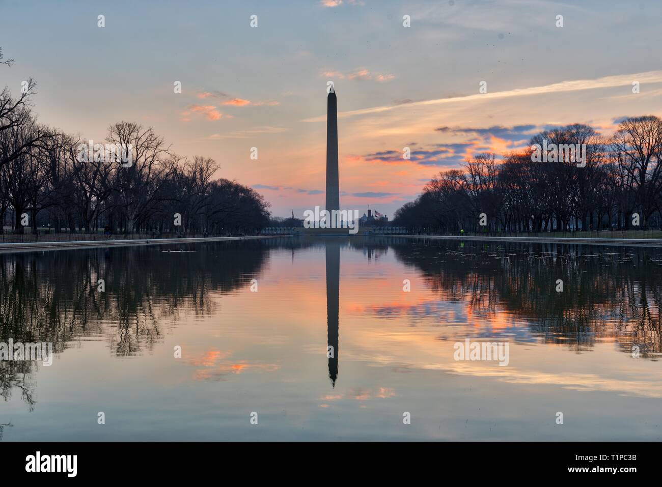 View of Washington Monument at sunrise with reflection on the Lincoln ...