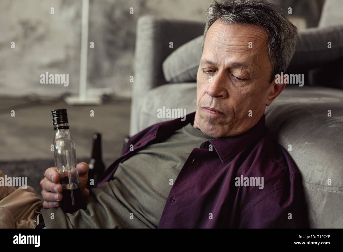 Old man drinking whisky hi-res stock photography and images - Alamy