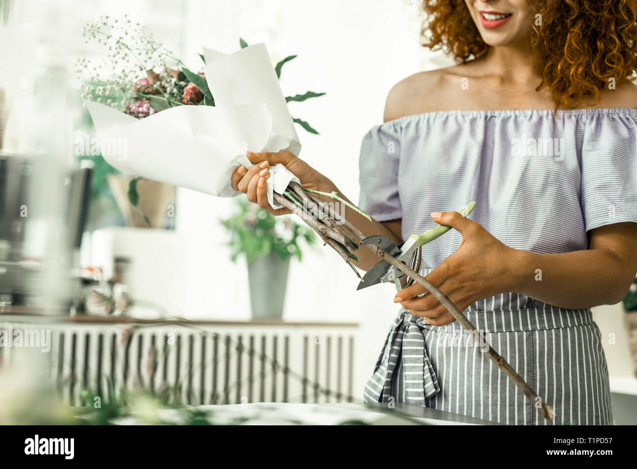 Young florist female finishing flower hi-res stock photography and ...