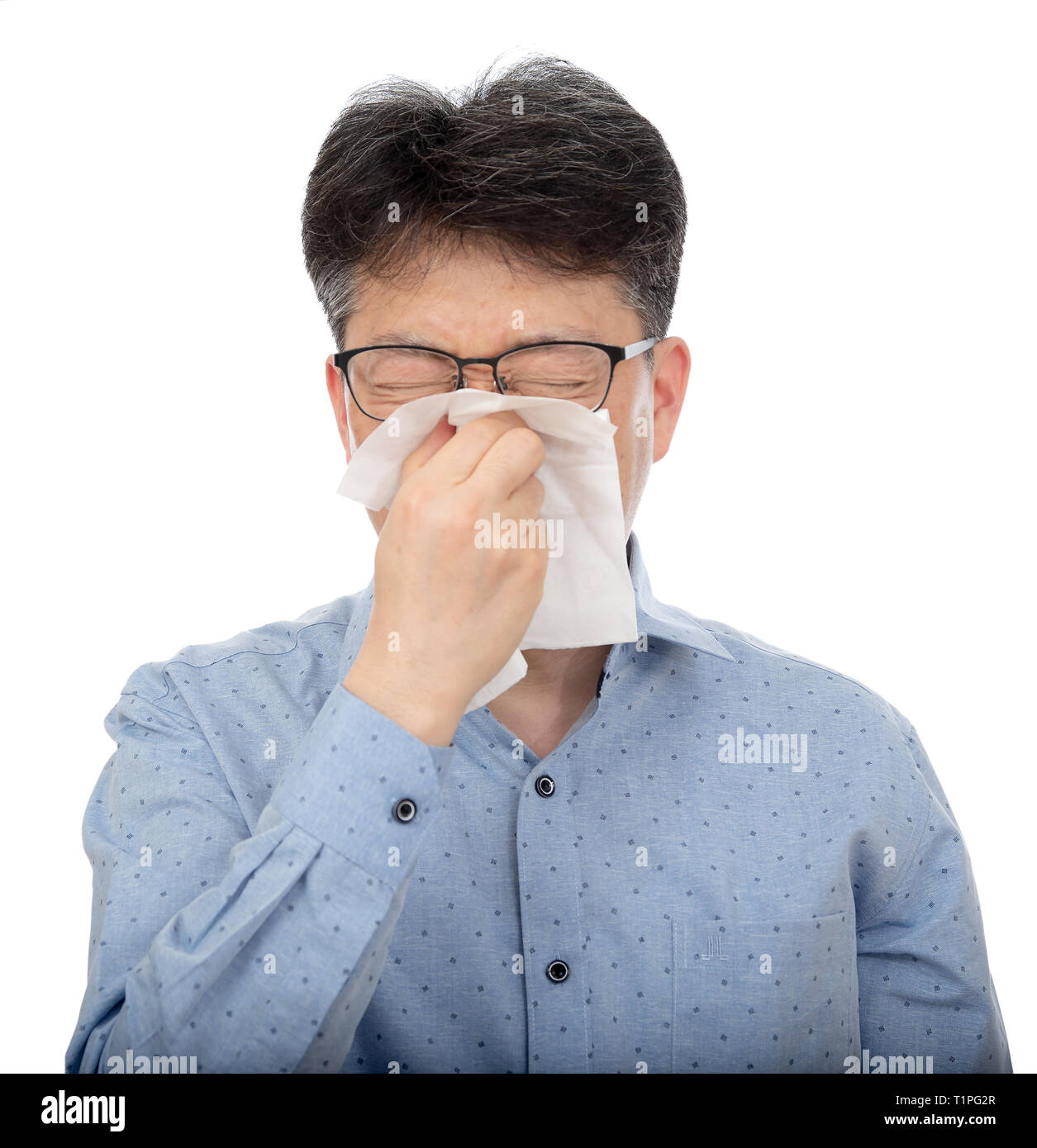 A middle-aged man suffering from rhinitis on white background Stock ...