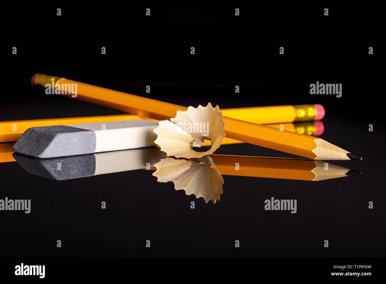 Group of two whole yellow pencil fan-shaped shaving with an eraser ...