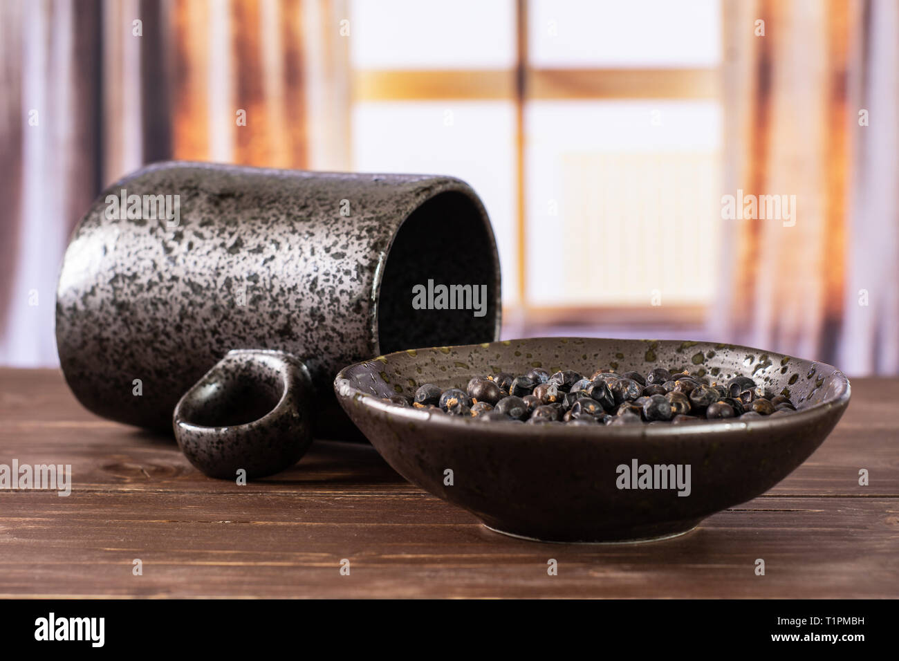 Lot of whole dry juniper berry seed with silk curtains behind Stock ...