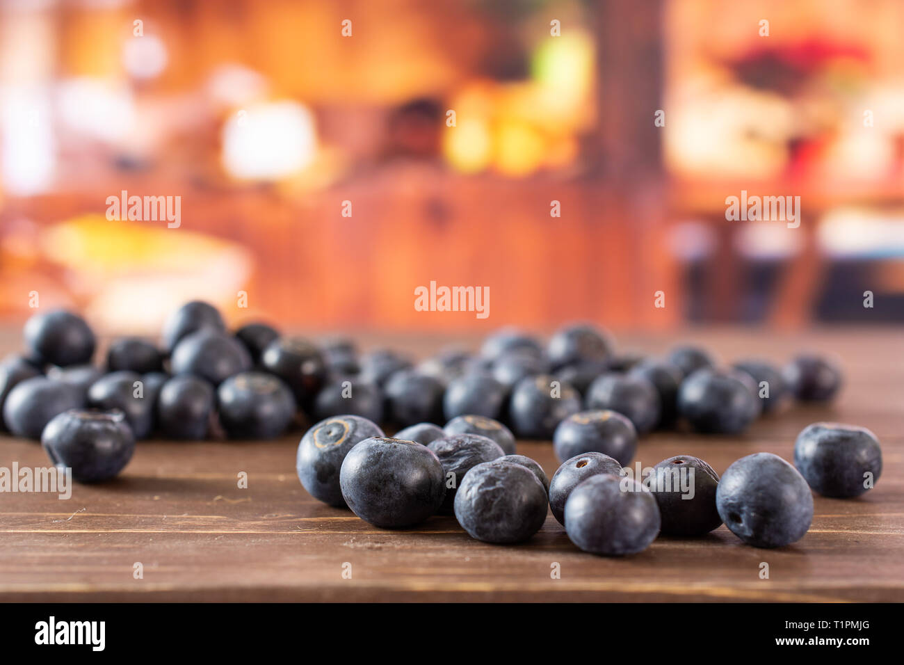 Lot of whole fresh sweet purple blueberry american with rustic wood ...