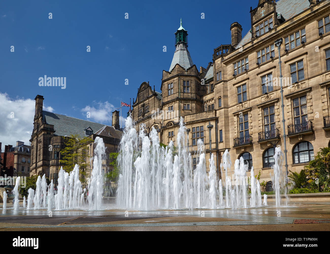 View of the fountain in the Peace Gardens with the neo-Gothic building ...