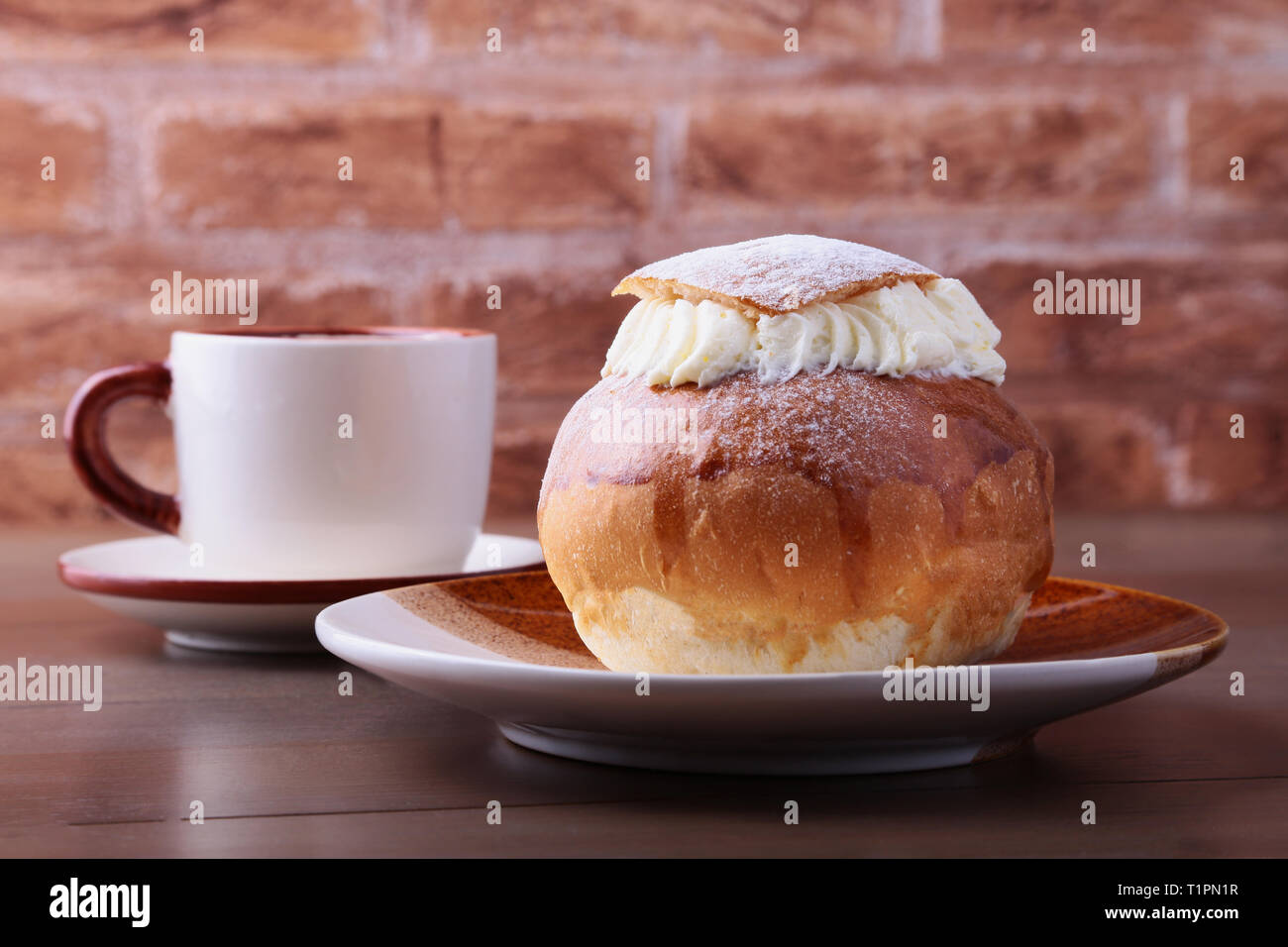Traditional swedish dessert Semla, also called Shrove bun, with almond ...