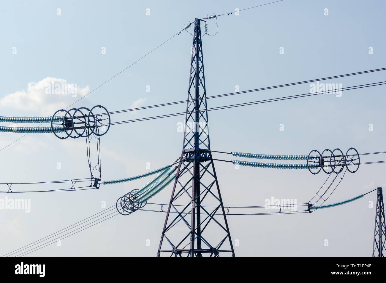 power line close up against the blue sky. Power a industry Stock Photo ...