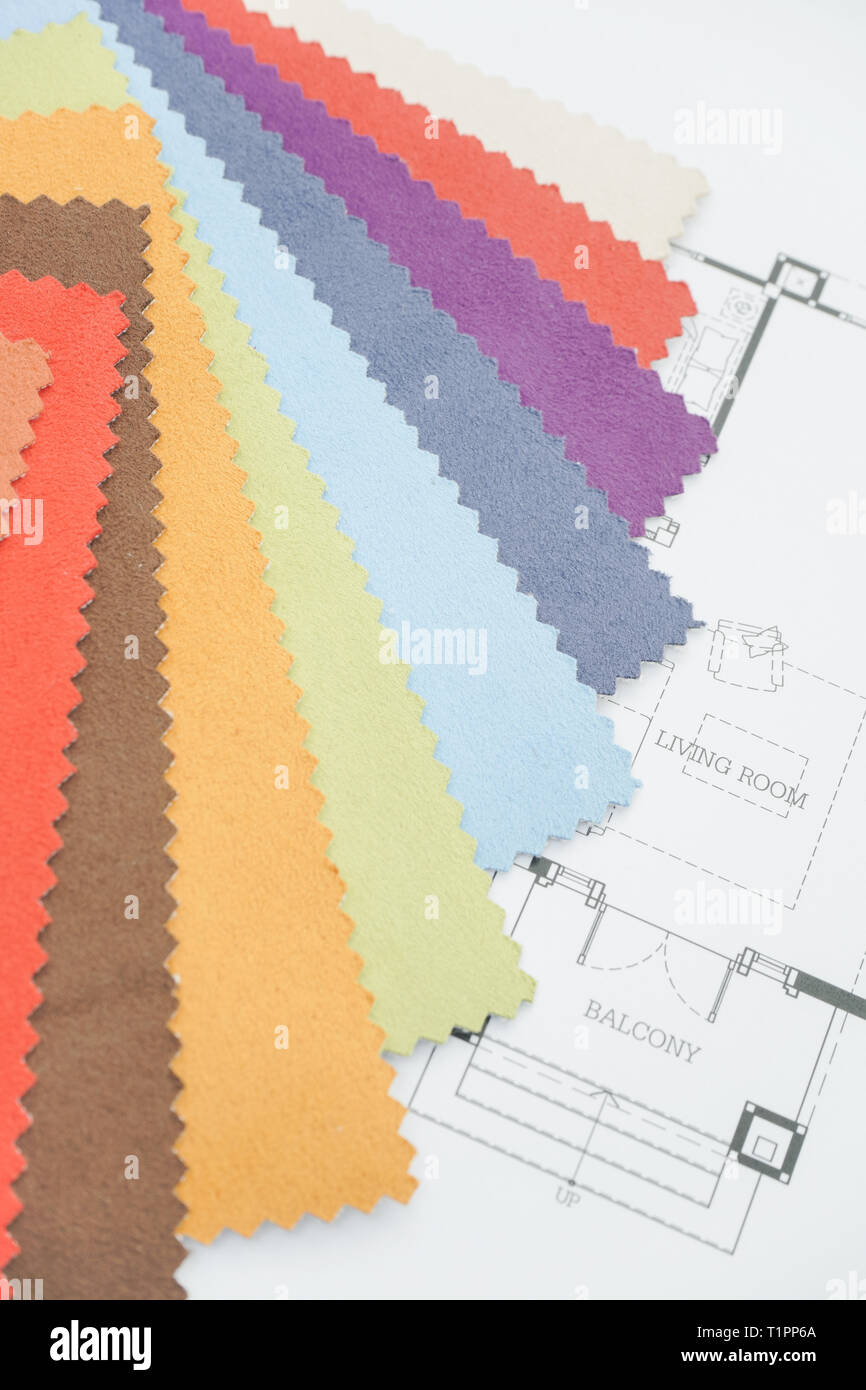 Colorful fabric sample with an architectural drawing paper on designer ...