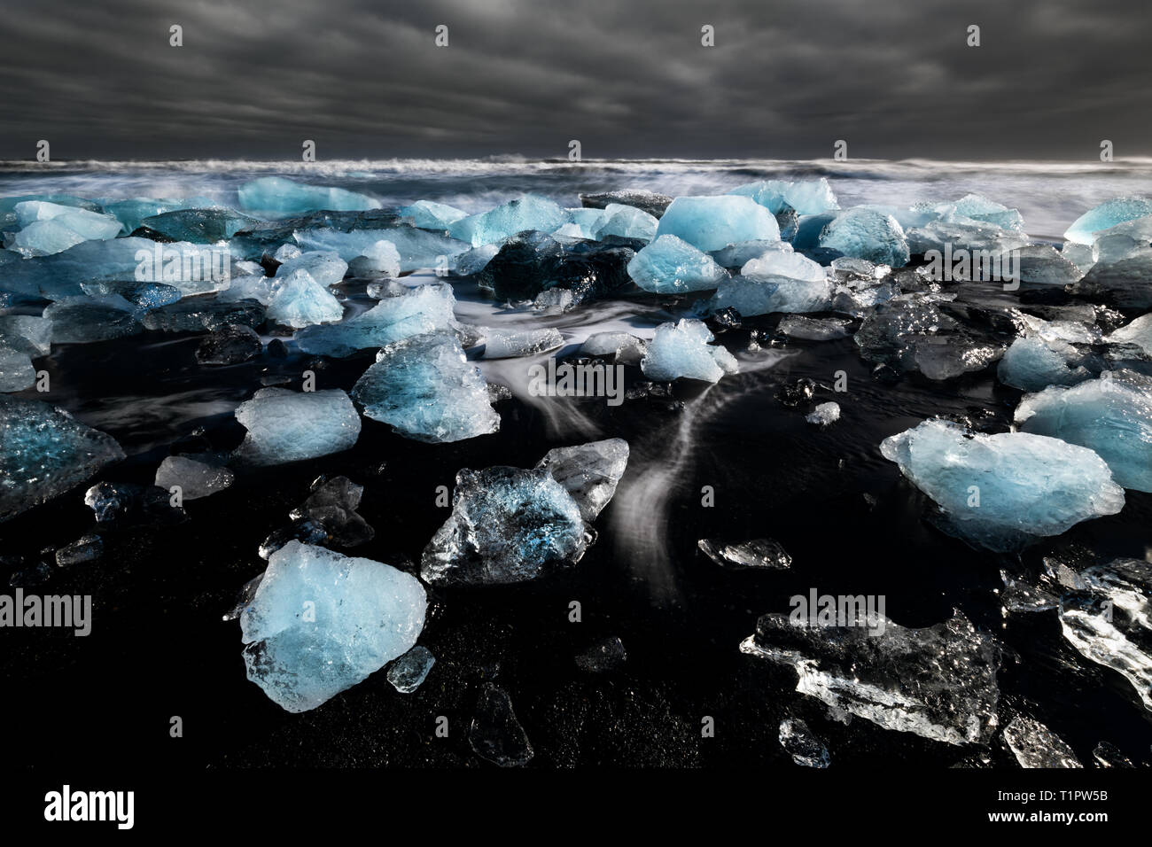 Icy diamonds at the black Diamond Beach Stock Photo - Alamy