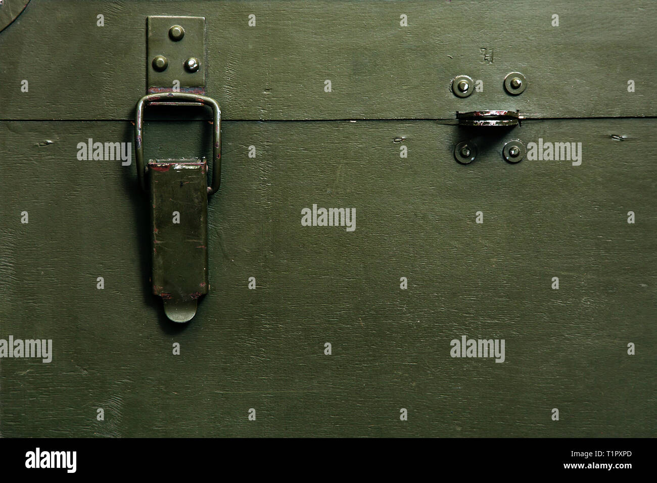 A green military storage box for ammunition. Green box from the war ...