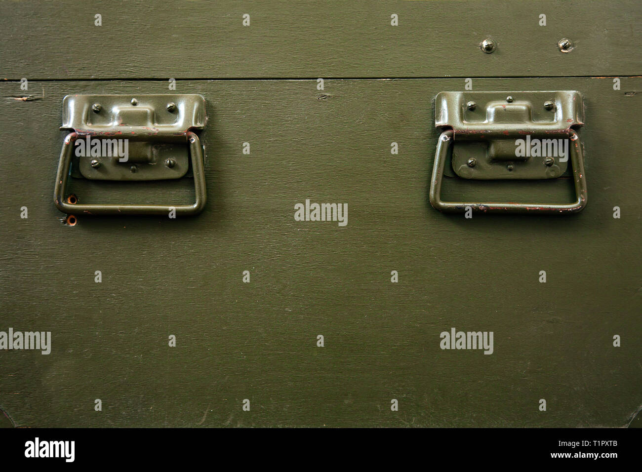 A green military storage box for ammunition. Green box from the war ...