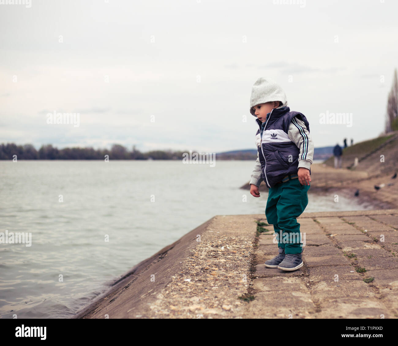 Kid throwing rock hi-res stock photography and images - Alamy