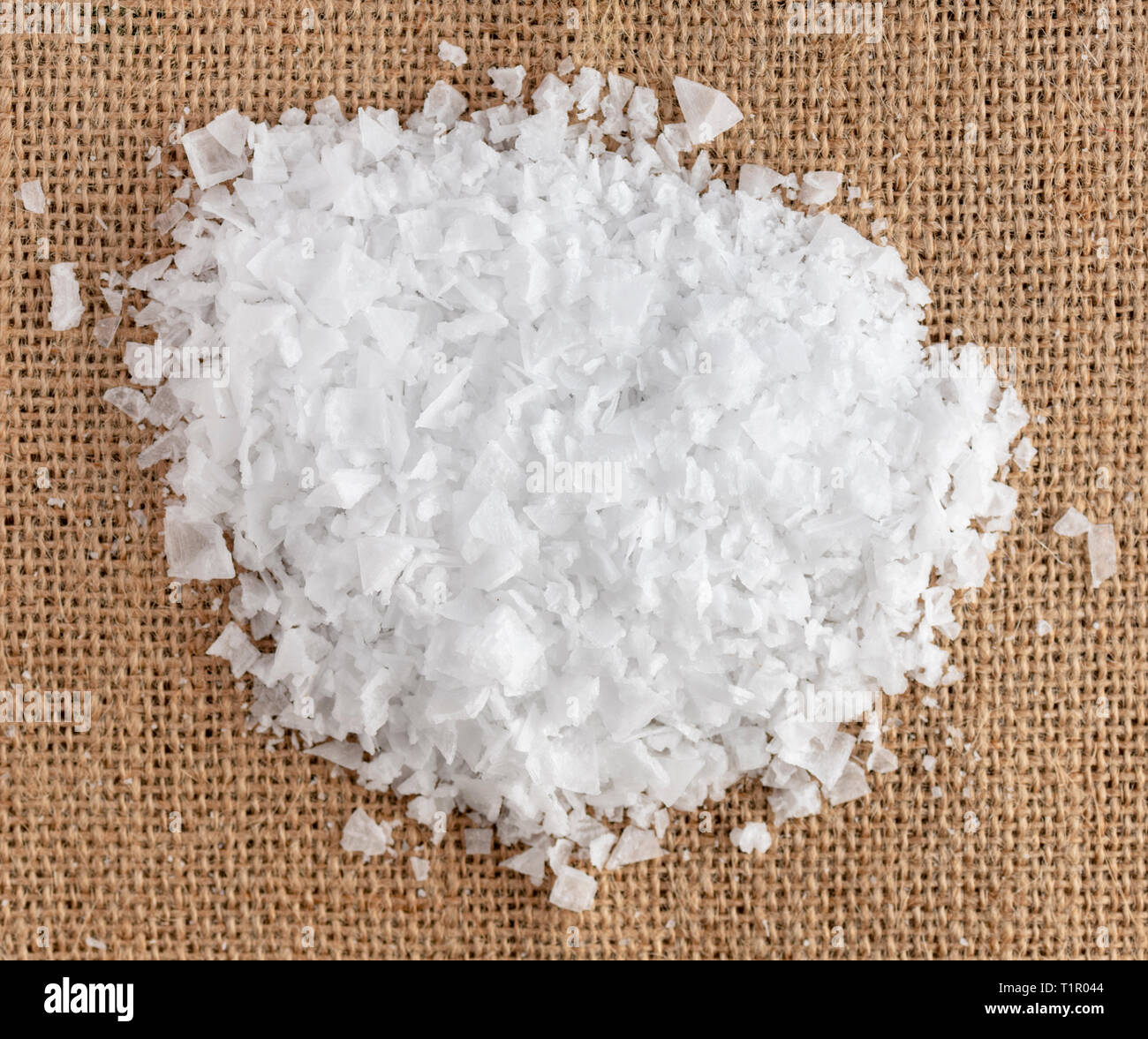 close up image of marine salt flakes with space in the background for ...