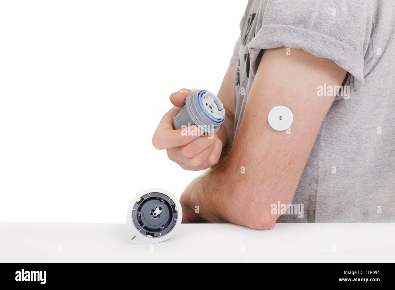 Man testing glucose level with a digital glucometer, sensor checkup ...