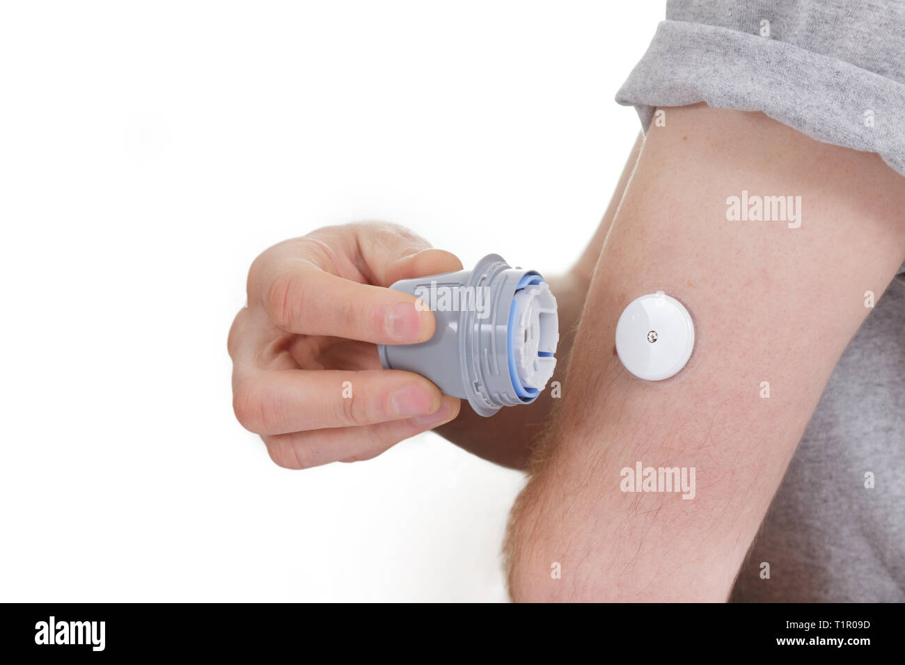 Man testing glucose level with a digital glucometer, sensor checkup ...