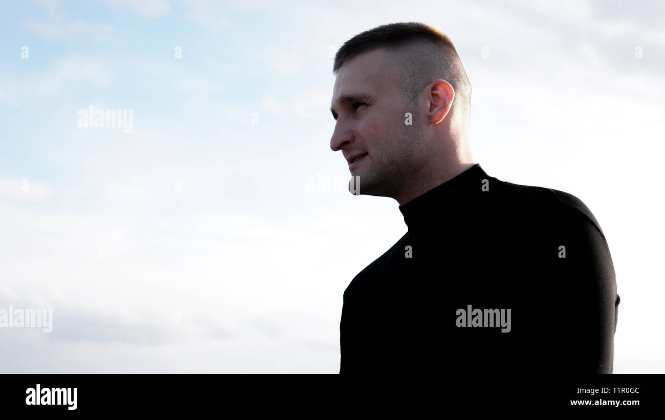 Outdoor portrait of young handsome smiling man - nature background ...