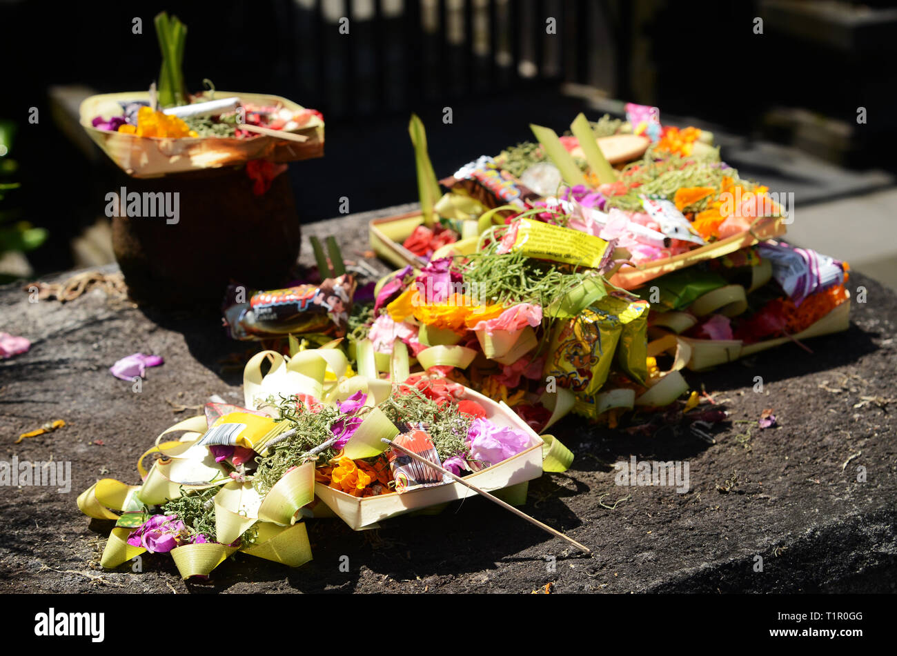 Traditional Balinese offerings to gods in Bali with flowers and ...