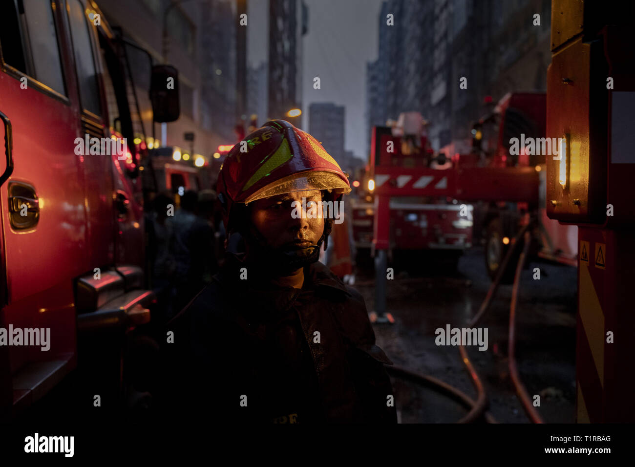 Dhaka, Bangladesh. 28th Mar, 2019. Bangladeshi firefighters works for ...