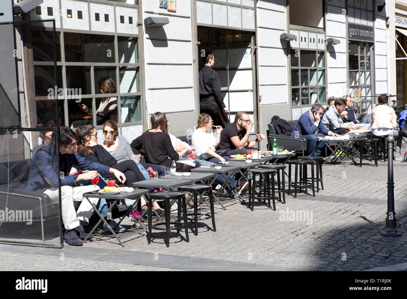 Aperitivo time at Radetzky Cafe, Milano Stock Photo - Alamy