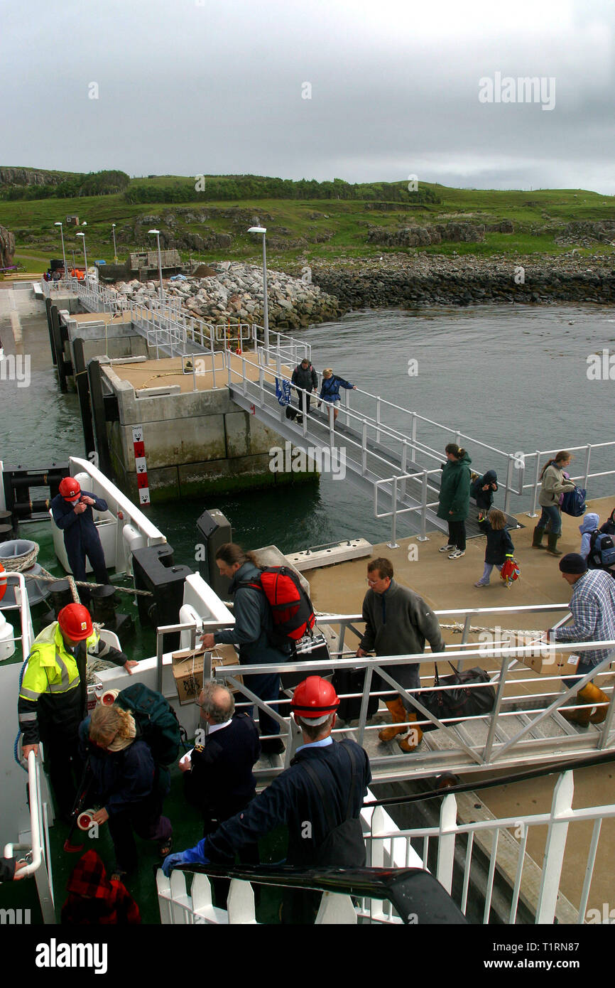 Passengers boarding the Caledonian-MacBrayne roll-on roll-off ferry ...